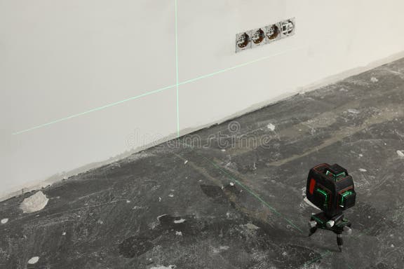 Laser Level on Floor Near Electrical Sockets Stock Image - Image of ...