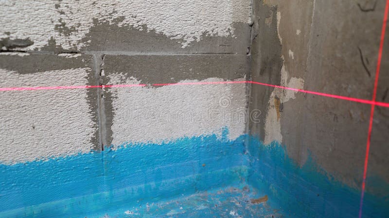 Laser Level Measuring Tool in Construction Site on the Floor in the ...