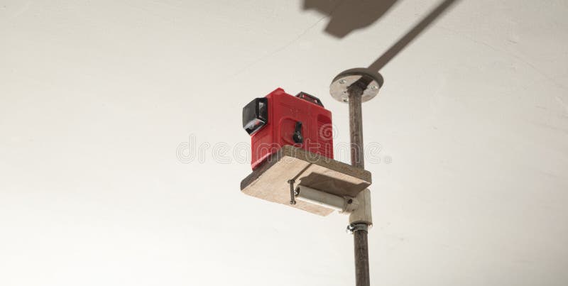 Laser Level Measuring Tool at Construction Site Stock Photo - Image of ...