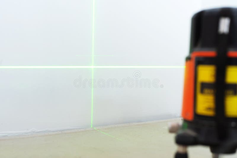 Laser Level. the Process of Marking and Finding Irregularities on a ...