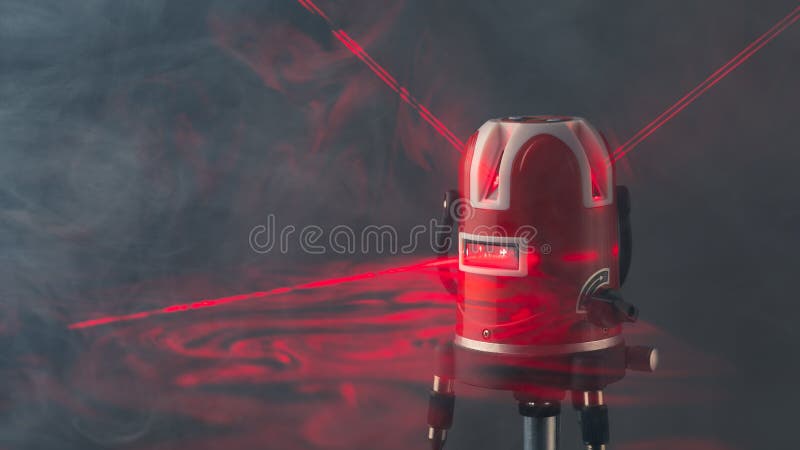 Laser Level Tool Red Light Beams in Smoke Stock Photo - Image of ...