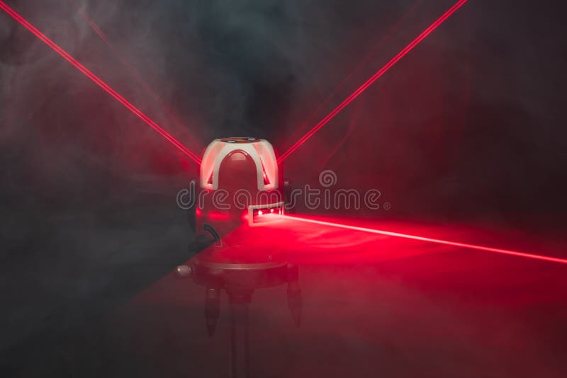 Laser Level Tool Red Light Beams in Smoke Stock Photo - Image of ...