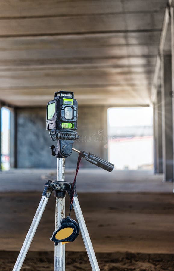 Laser Level on a Tripod at a Construction Site. Close-up Stock Photo ...