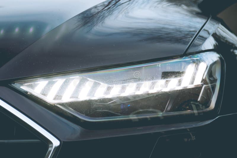 Laser and Matrix Headlights of a Premium Car. Close-up Stock Photo ...