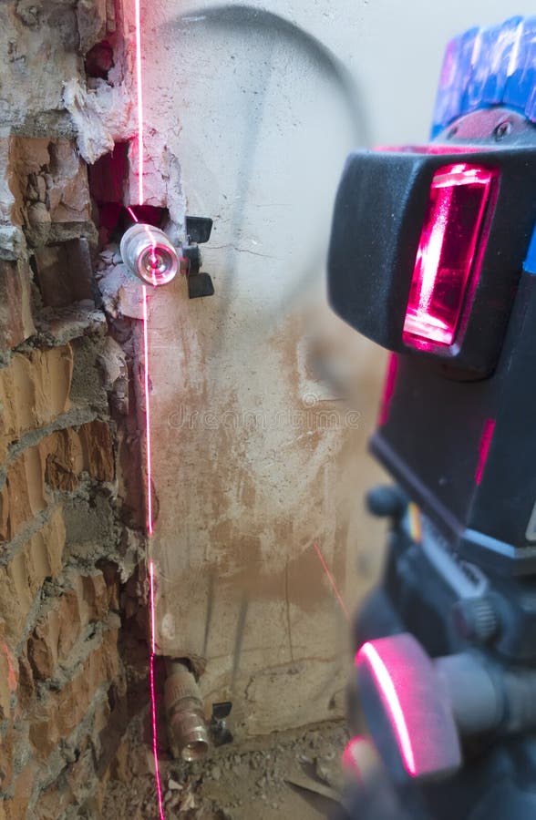 The Laser Measurement Level Shows the Vertical for Heating Pipes Stock ...
