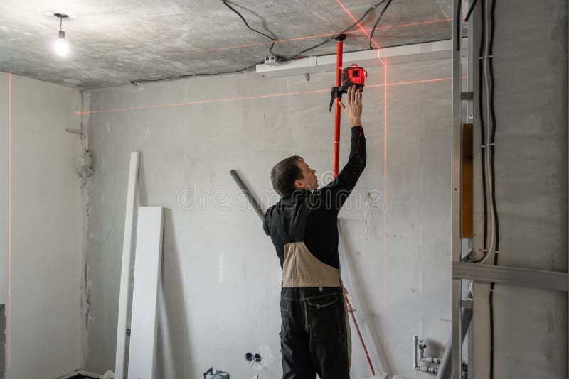 Laser Measurement during Renovation. Construction Tools and Equipment ...