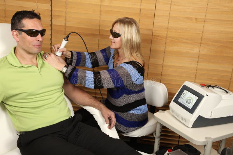 Laser physiotherapy stock image. Image of device, pressing - 34996635