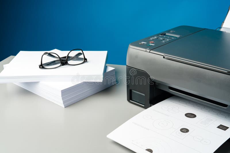 Laser Printer on Desk Against Blue Background. Stock Image - Image of ...