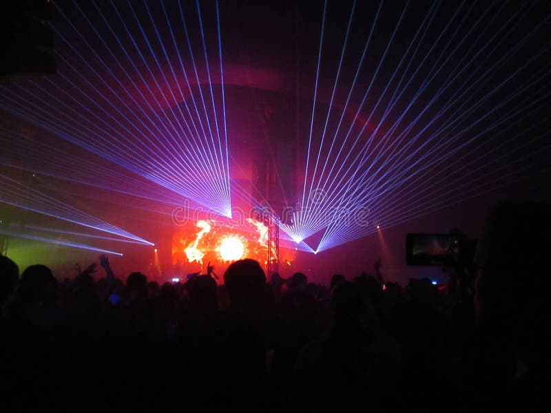Laser Show in a Dazzling, Red Light. Stock Photo - Image of ...