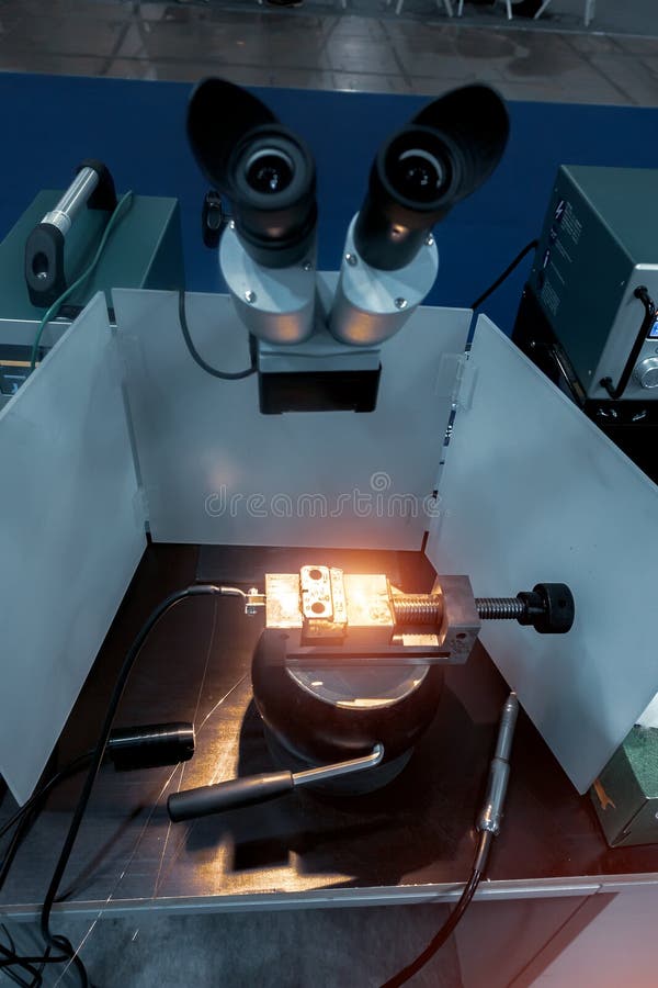 Laser Welding of Small Parts Using a Microscope Stock Photo - Image of ...