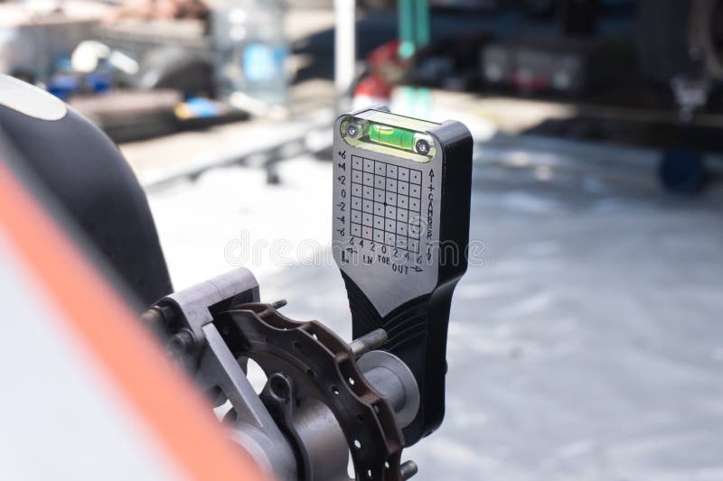 Laser wheel alignment stock photo. Image of inspection - 324383558