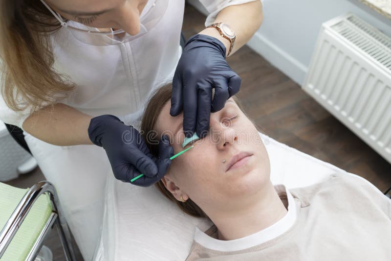 Lashmaker Sets Silicone Roller on Eyelid Client for Eyelash Lamination ...