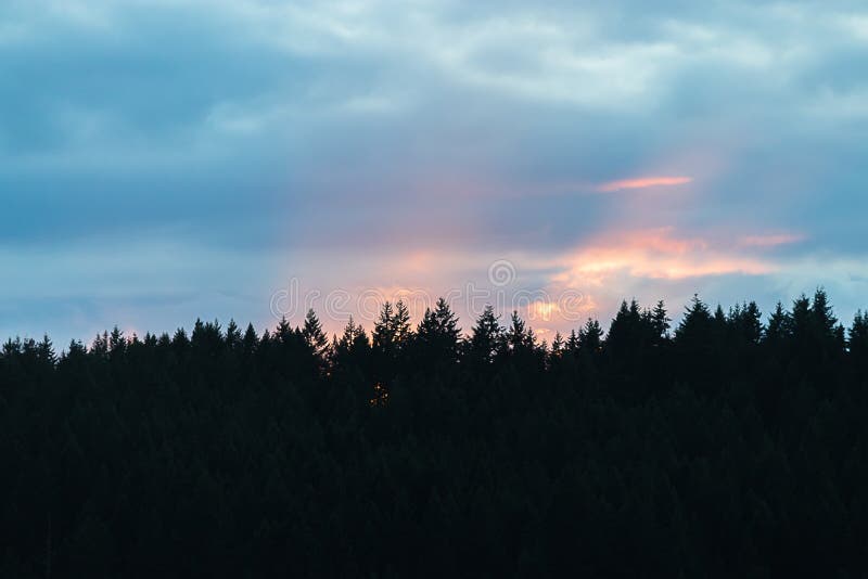 Bright Red Sunrays of a Setting Sun Stock Image - Image of light ...