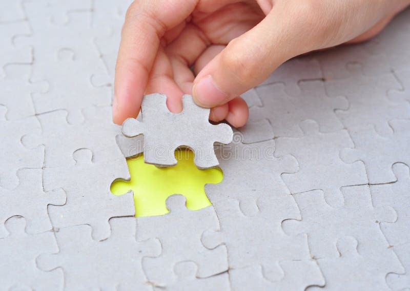 The Last Piece of Jigsaw Puzzle Stock Photo - Image of partnership ...