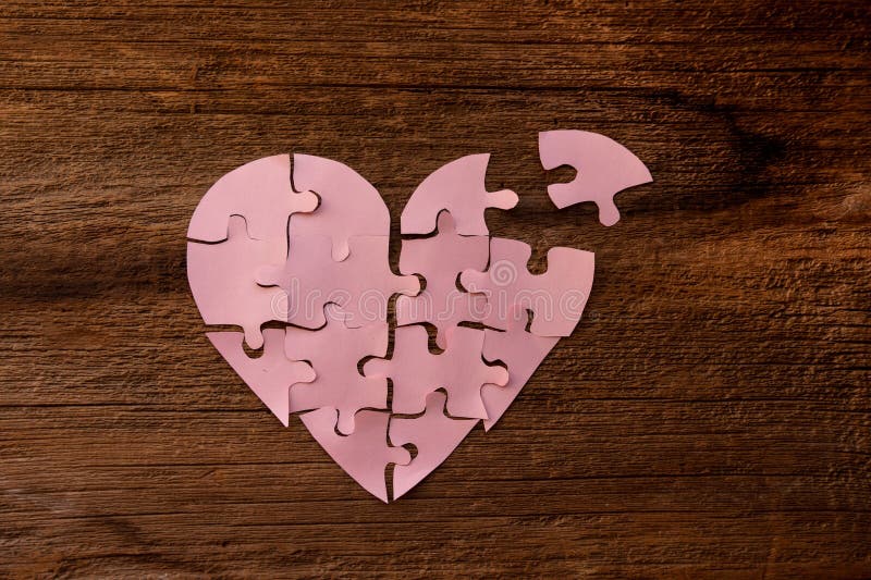 The Last Piece of a Pink Heart Puzzle Stock Photo - Image of pieces ...