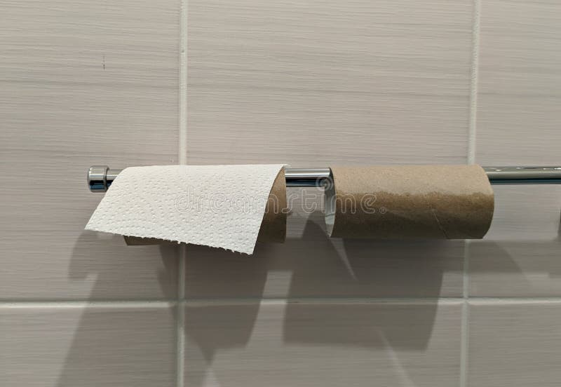 The Last Sheet of Toilet Paper from the Two Rolls Was Left. Stock Image ...