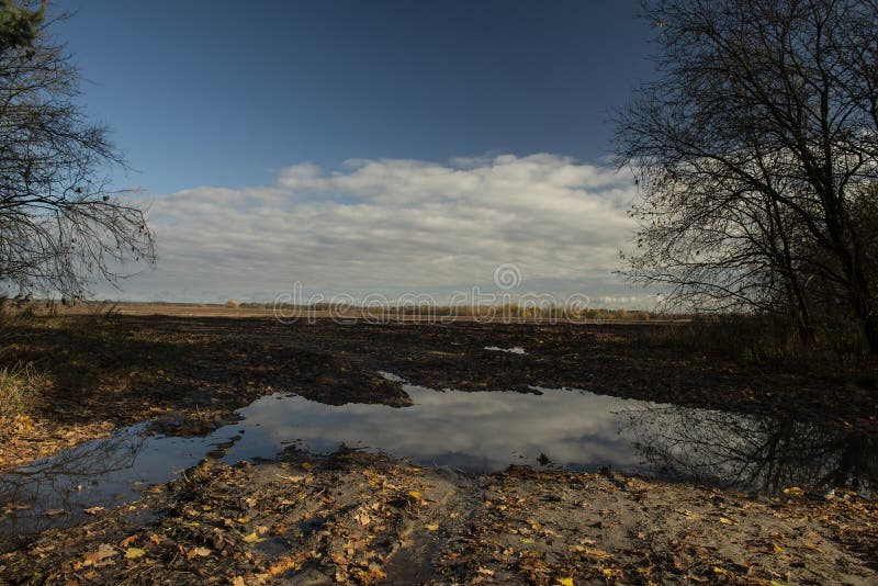 Late Fall. Harvest in the Fields. Reflection of the Sky with Clouds in ...