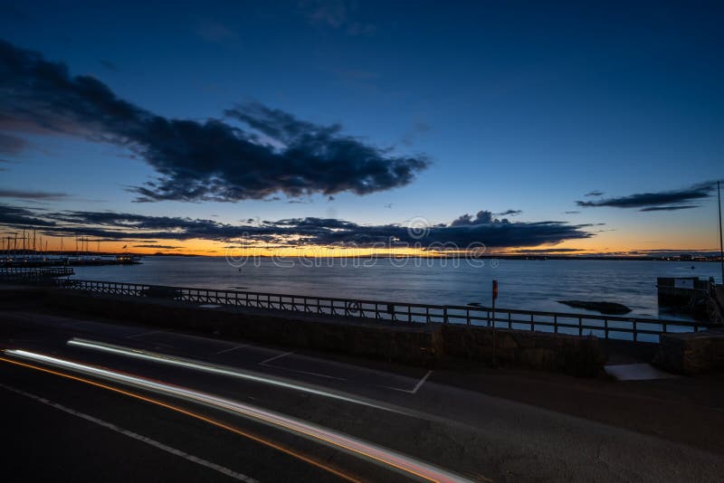 Late Night View from a Harbor Over the Sunset.. Stock Image - Image of ...