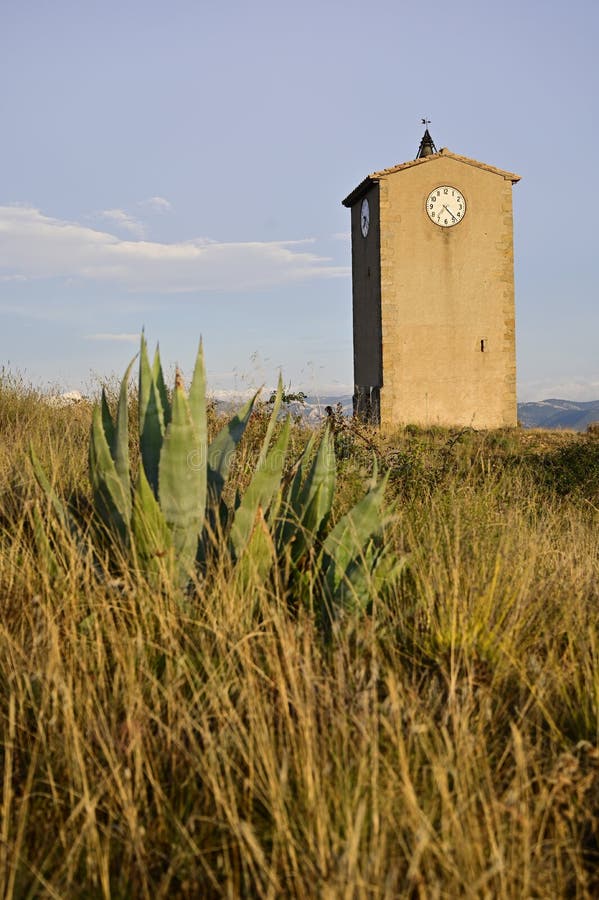 Lateral Vertical View of an Ancient Clock Tower on Top of the Hill in ...
