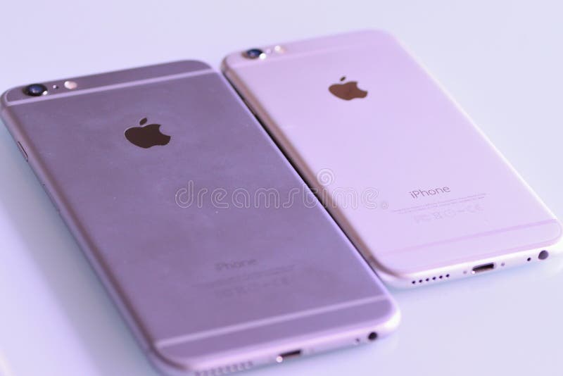 Latest IPhone on Desk in Horizontal Frame with Blurred Laptop PC ...