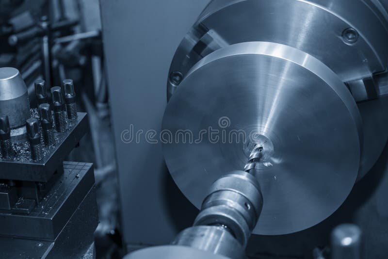 The Lathe Machine Hole Cutting the Metal Parts by Drill Tools Stock ...