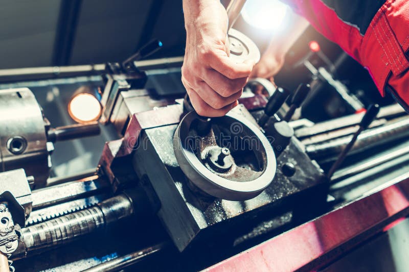Lathe Machine Technician Processing a Piece of Metal Stock Image ...