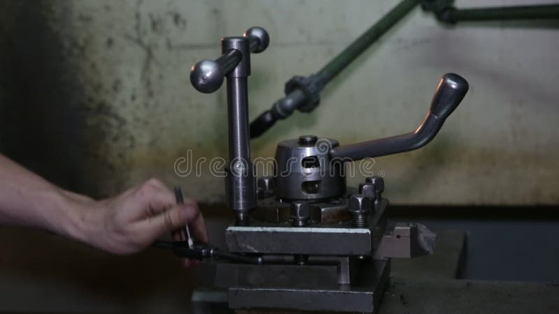 Machine Operator Operates on Old Lathe Machine.Turning Lathe in Action ...