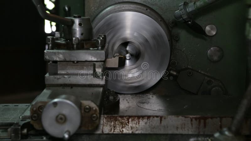 Machine Operator Operates on Old Lathe Machine.Turning Lathe in Action ...