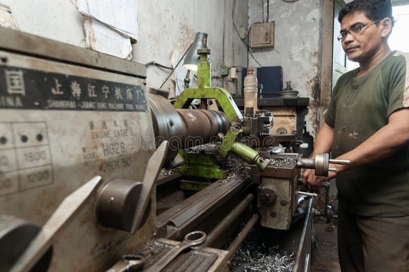 Lathe Workshop Worker is Doing Metal Drilling Work Editorial Photo ...