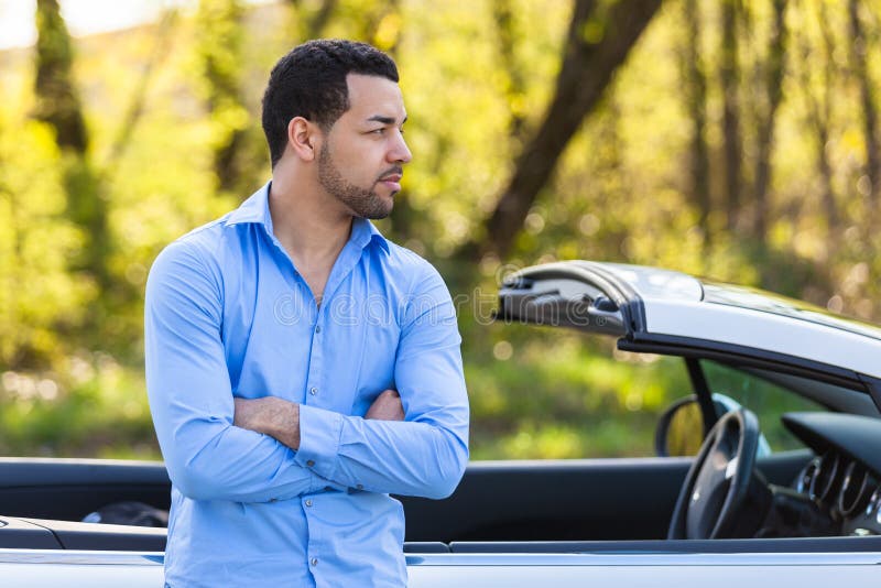Latin American Driver Seated on the Side of His New Car Stock Image ...