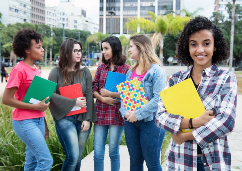 Latin American Female Student with Group of International Students ...