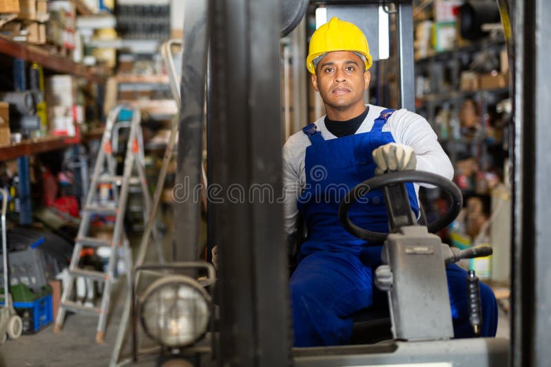Latin American Operator of Forklift Working in Construction Hypermarket ...