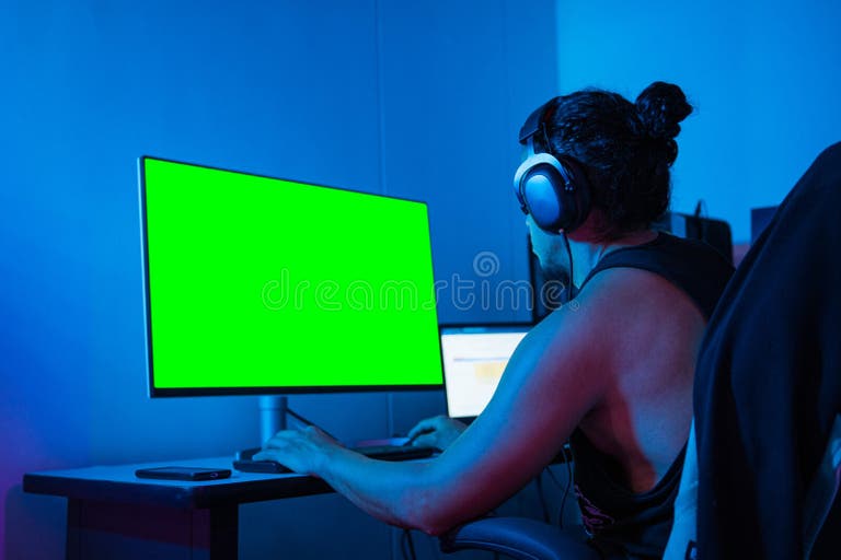 Latin American Young Man Using Computer at Night. Stock Photo - Image ...