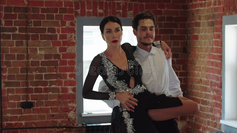 Latin Dances - a Couple Spinning in the Pair Dance while Training in ...