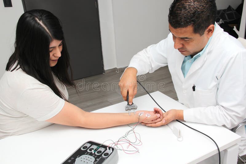 Latin Doctor Specialist Neurologist Performs a Study of Evoked ...