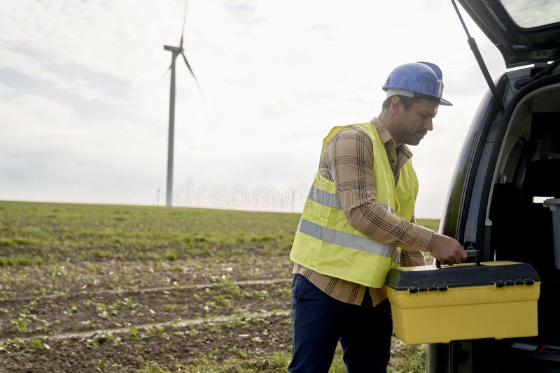 Maintenance Engineer Taking a Tool Box Out of the Car Stock Photo ...