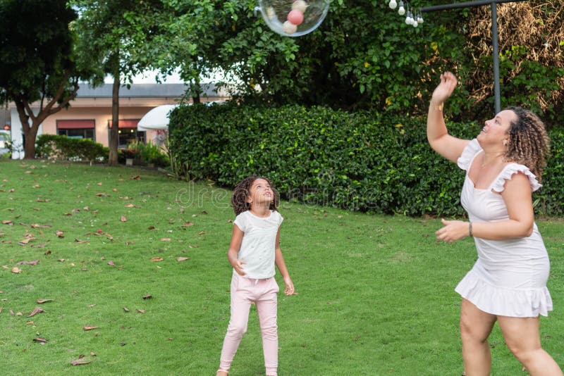 Latin Family Playing Ball Game in the Park Stock Photo - Image of ball, people: 265863550