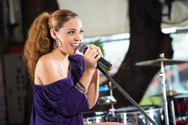 Two Cuban female singers stock photo. Image of performance - 39614026