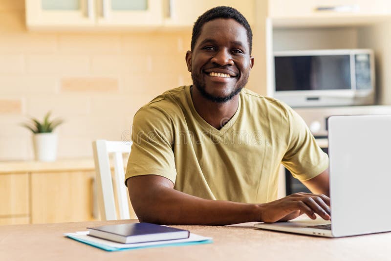 Latin Hispanic Man Freelancer Using Laptop Studying Online Working from ...