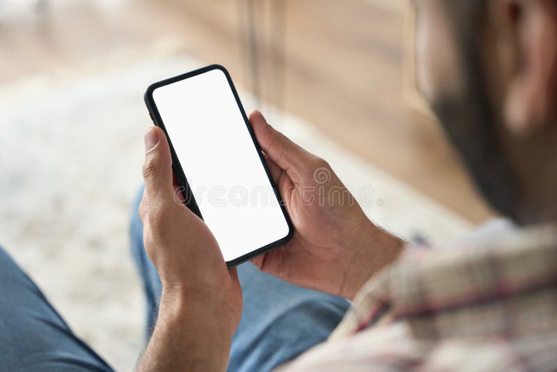Male Hands Holding Cellphone Empty White Screen Over Shoulder Closeup