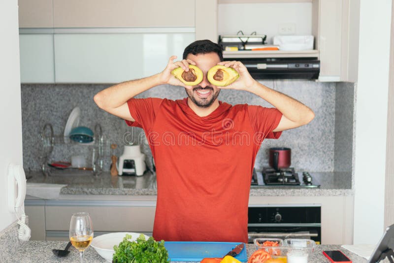 Latin Man Having Fun while Cooking at Home Stock Photo - Image of ...