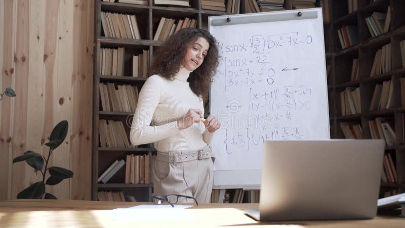 Latin Female Professional Teacher Giving Online Remote Math Class on ...