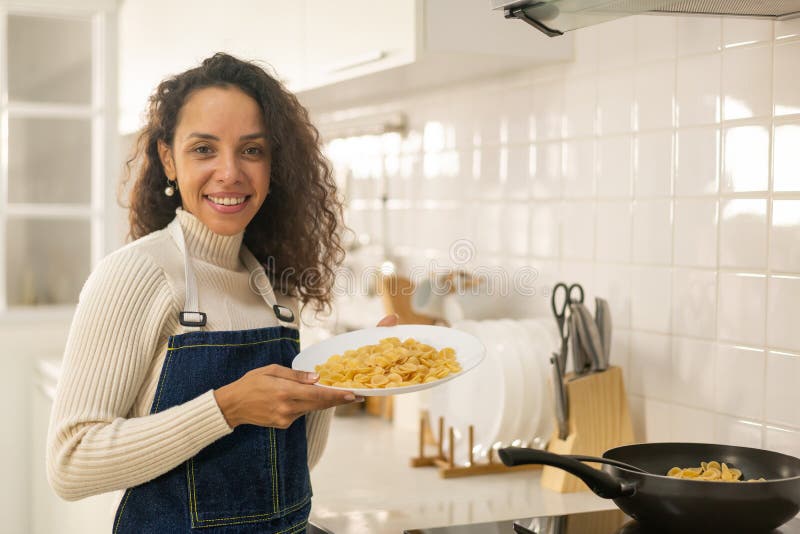 Latin Woman Shooting Video and Cooking at the Kitchen Stock Image ...