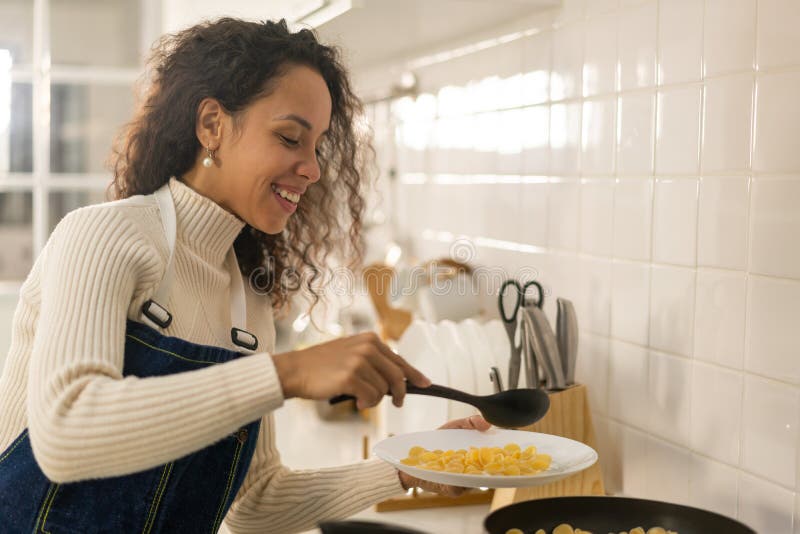 Latin Woman Cooking in Kitchen Stock Image - Image of people, modern ...