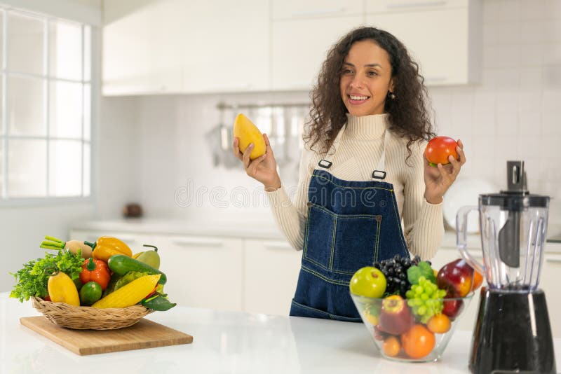 Latin Woman Making Juice in Kitchen Stock Image - Image of lifestyle ...