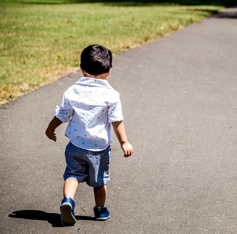 Latino Child Walking Alone Outside Stock Photo - Image of preschooler ...