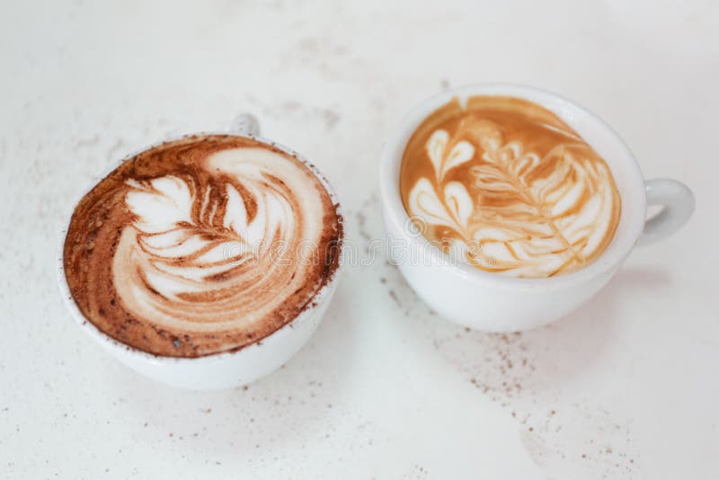 Two Cups of Beautiful Coffee Art Cappuccino Stock Photo - Image of pair ...