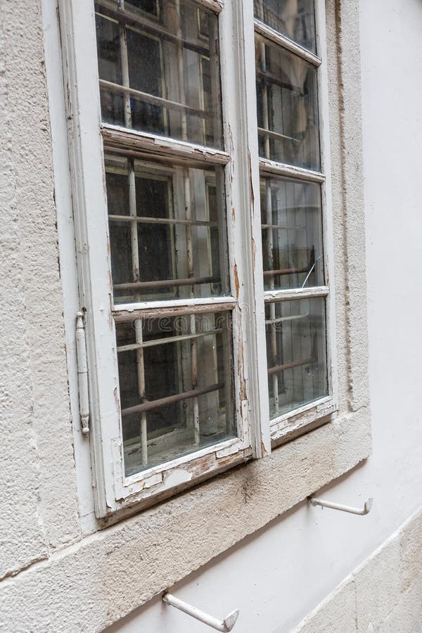 Lattice window in the wall stock photo. Image of metallic - 100651060