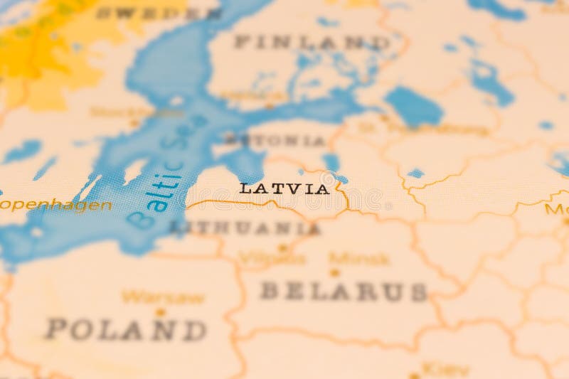 Latvia in Focus on a Tilted World Map. Stock Illustration ...