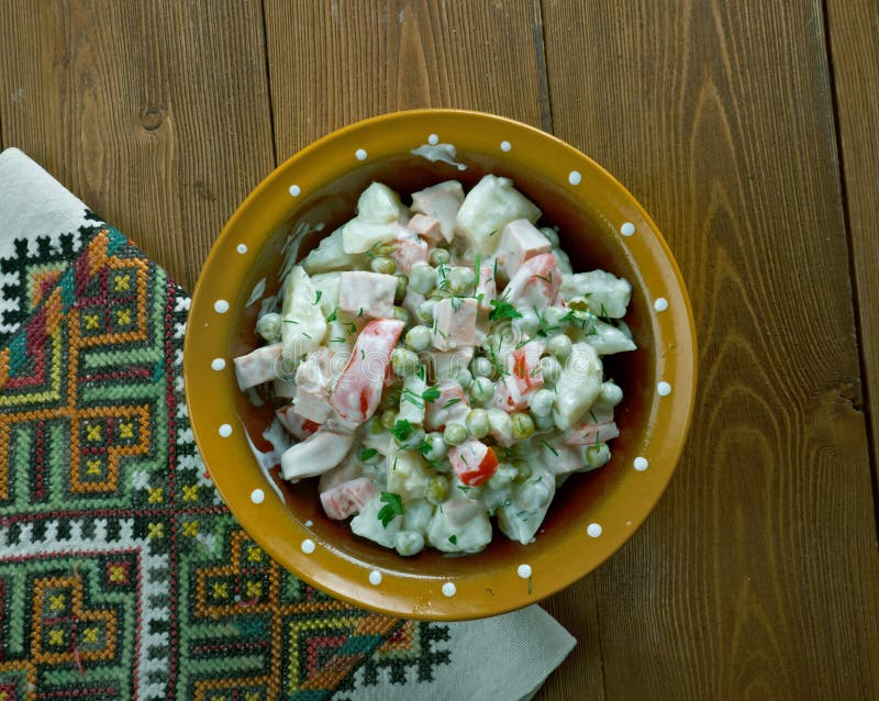 Latvian Salad Rosols Made of Vegetables with Herring and Beef in a Bowl ...